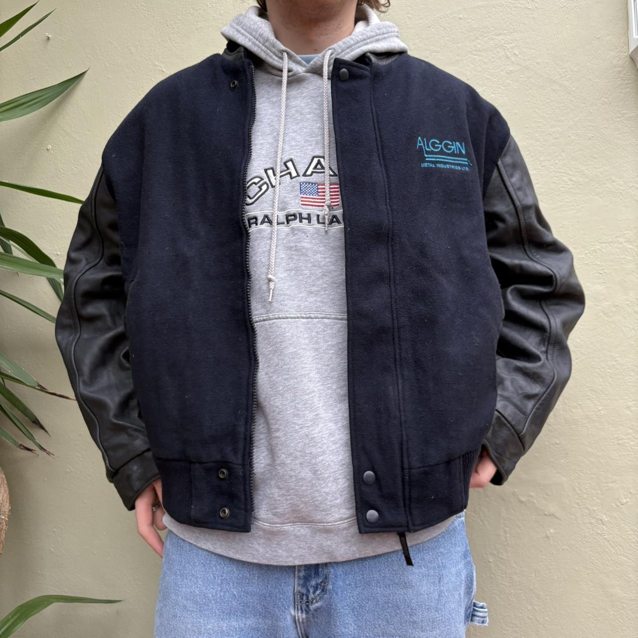 Varsity jacket in black and navy with leather arms,... | Depop