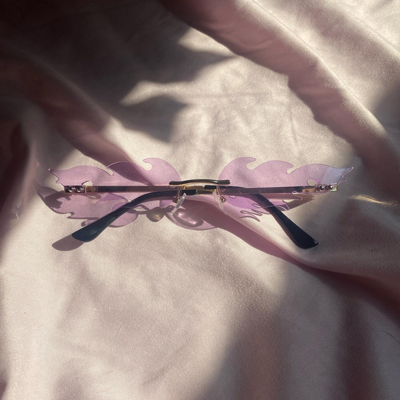purple flame glasses with gold accents - Depop
