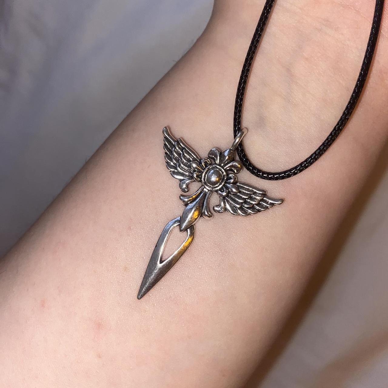 angel dagger necklace on black cord 🪽🗡️| free... - Depop
