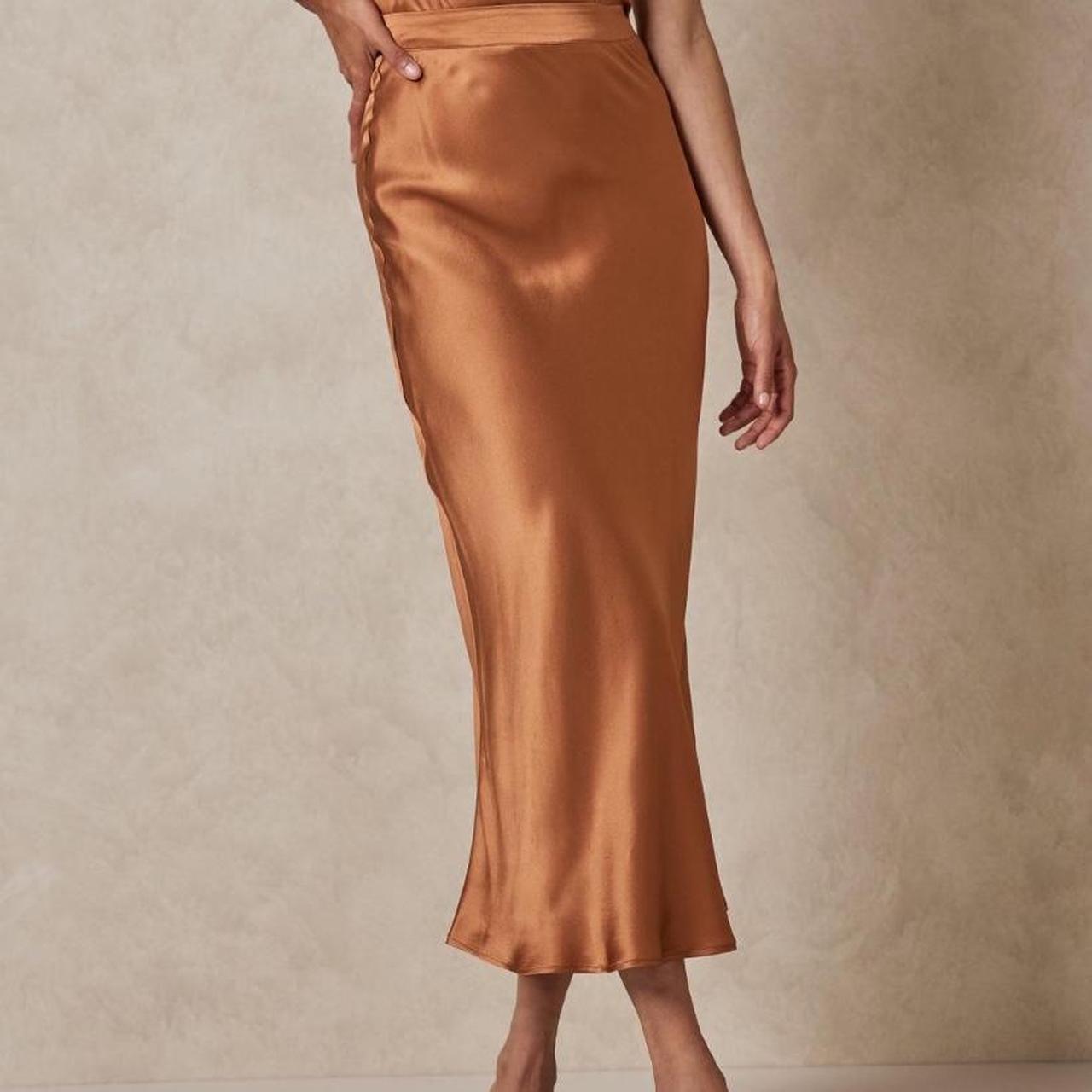 The iconic Aere orange skirt skirt size 14 - worn once. - Depop