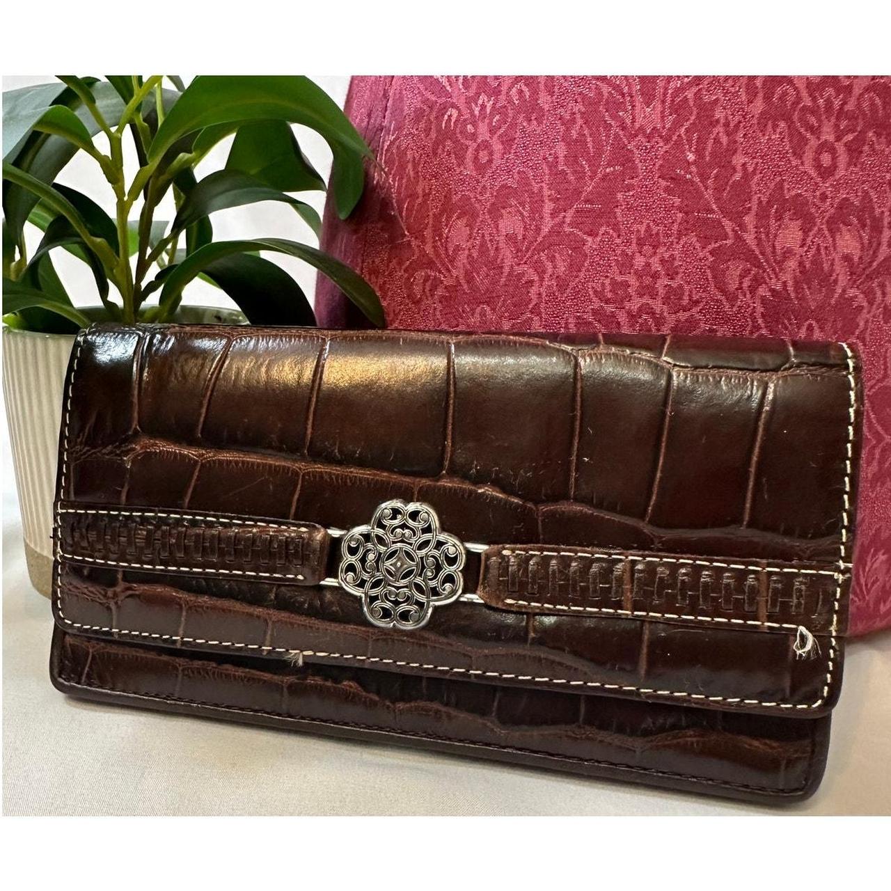 This stylish Brighton wallet features a beautiful... | Depop