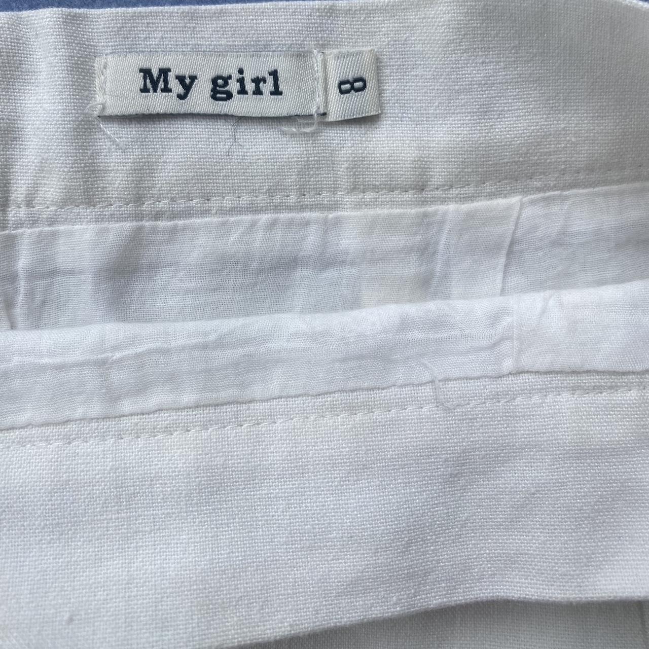 My girl white skirt size 6. Small tare in the split - Depop