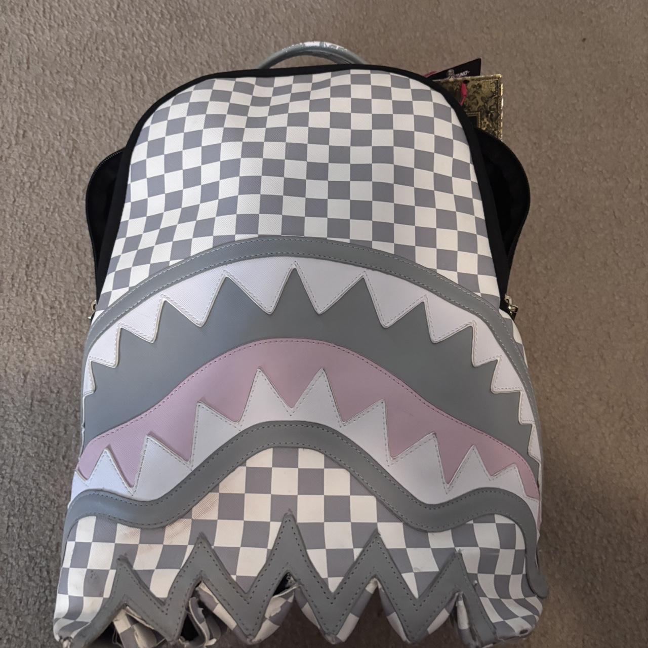 Grey leather sprayground backpack with bite mark at... | Depop