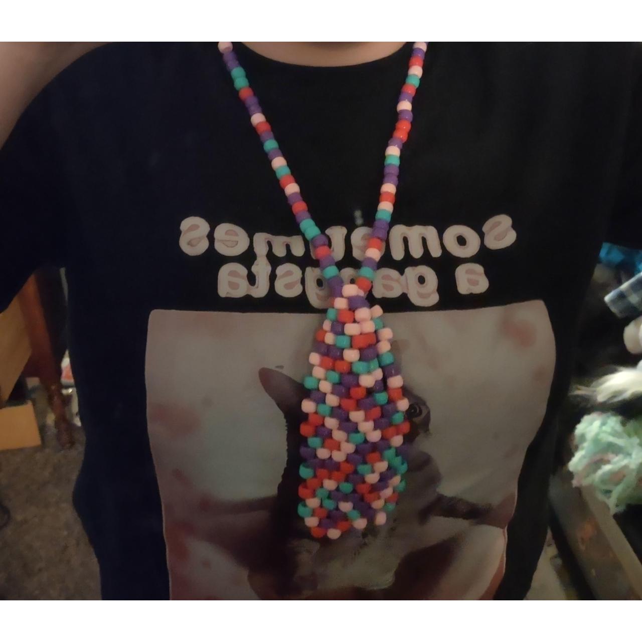 really mediocre kandi tie, you can't tell because of... | Depop
