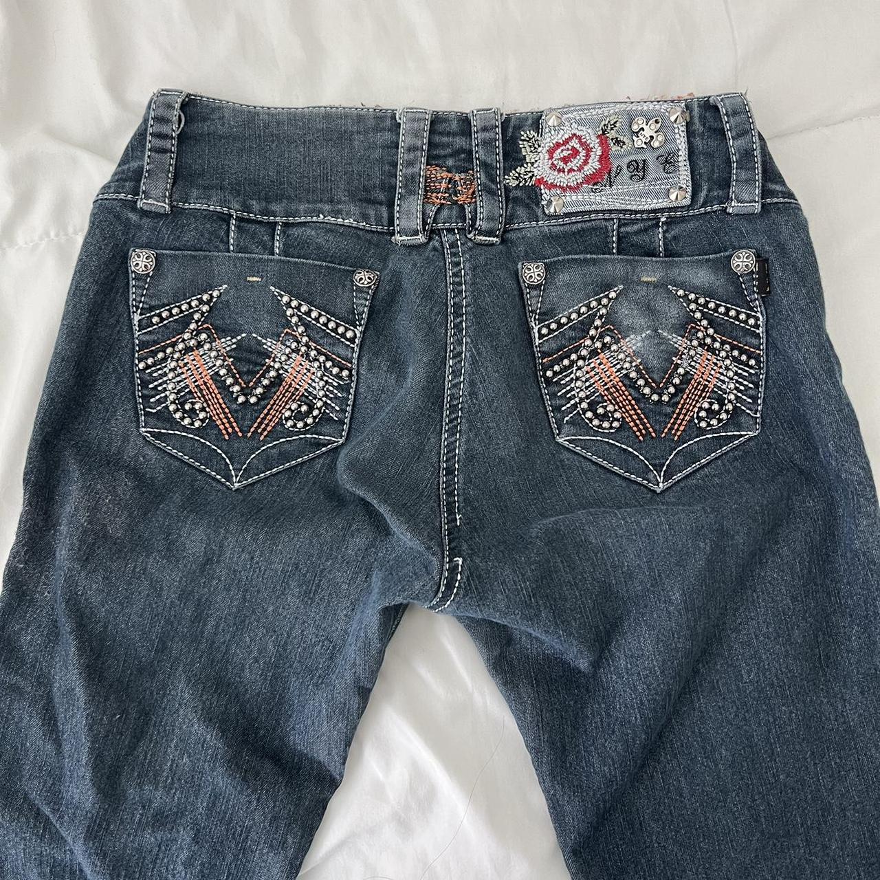 Low rise bling pocket jeans with rose embroidery... - Depop