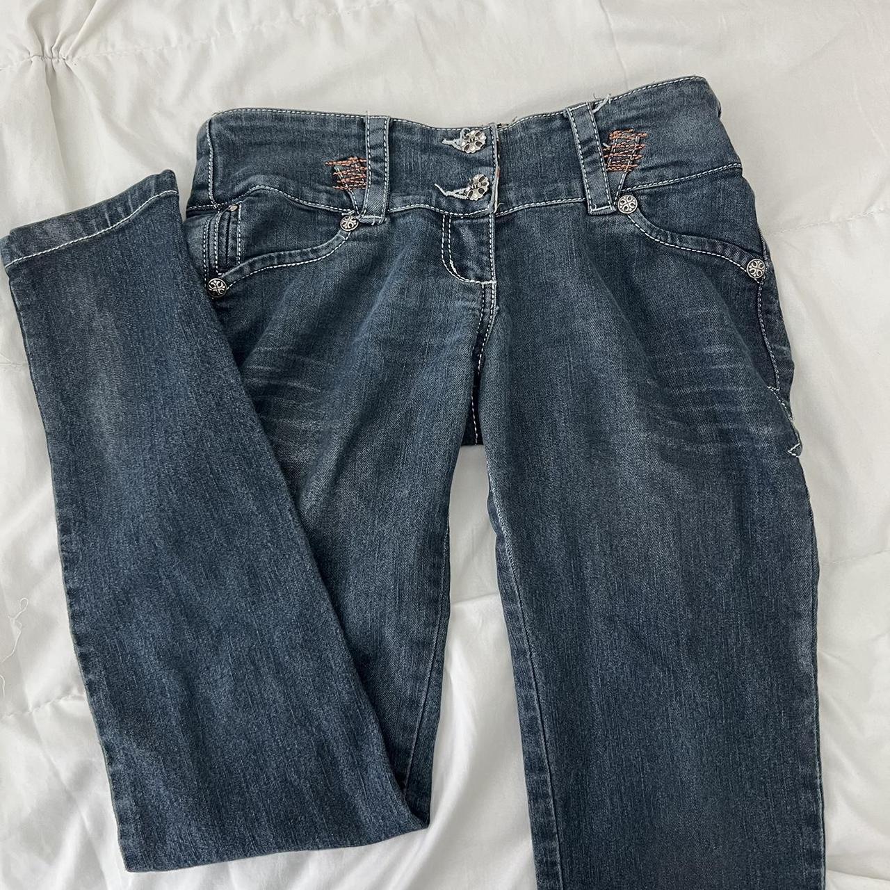 Low rise bling pocket jeans with rose embroidery... - Depop