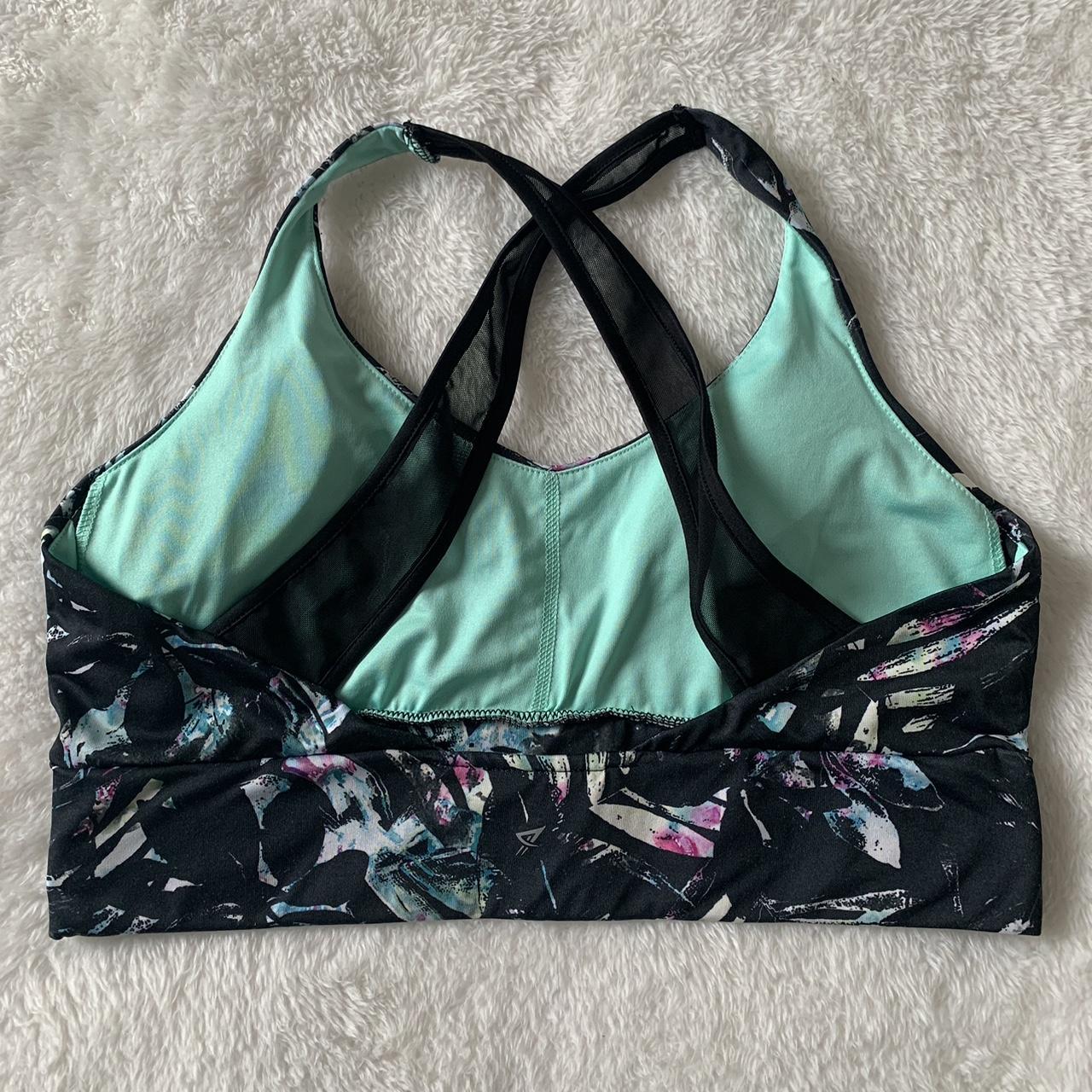 floral patterned sports bra. cross over straps.... - Depop