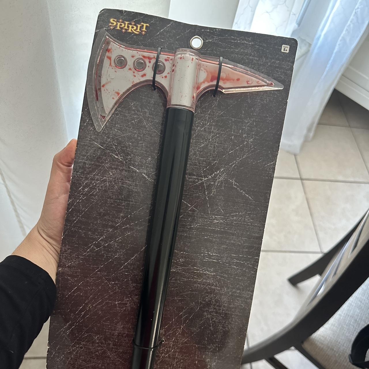 Spirit Halloween (FAKE) Bleeding Hatchet... - Depop