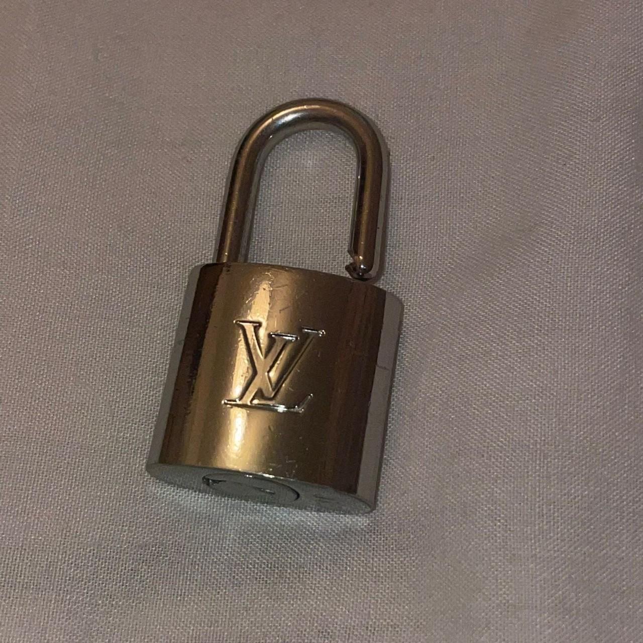 Real Silver Louis Vuitton Padlock. Can go on chains,... - Depop