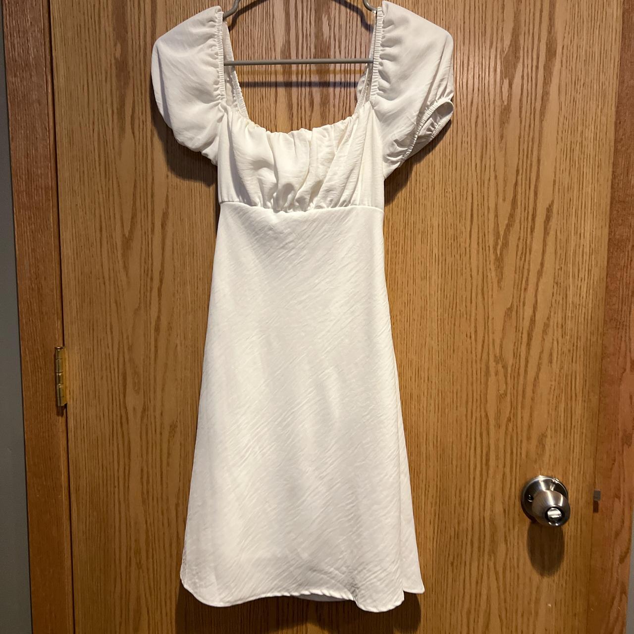 altered state white mini dress with a zipper and bow... - Depop