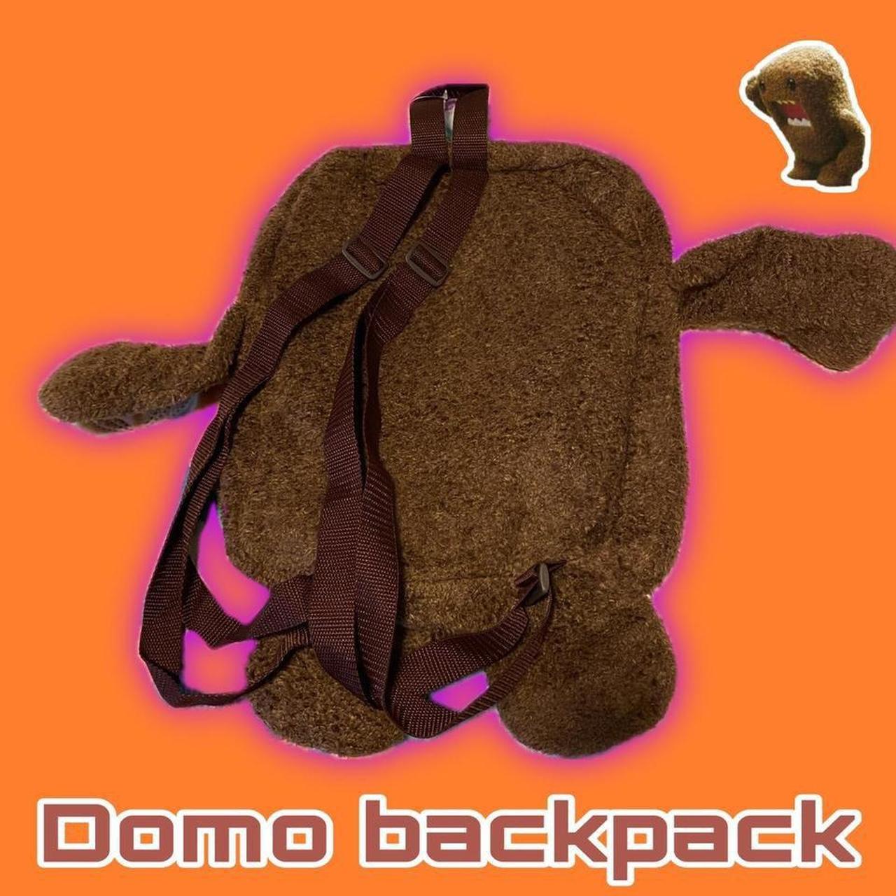 Domo bag the teeth are not stitched down the teeth... - Depop