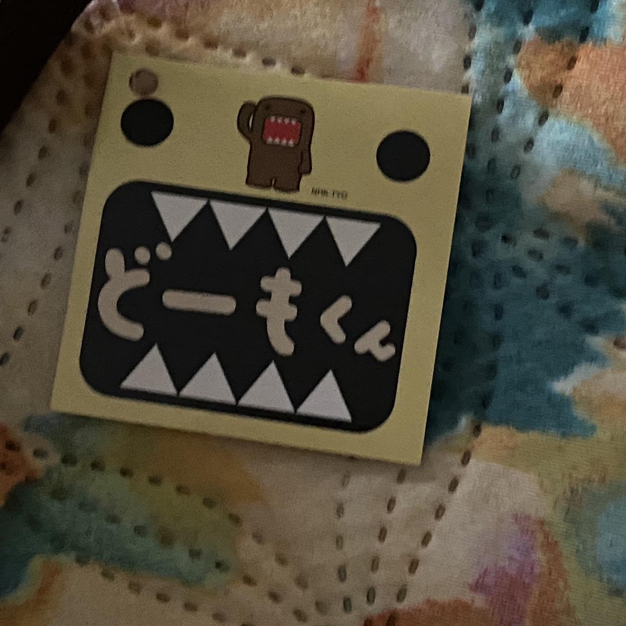 Domo bag the teeth are not stitched down the teeth... - Depop