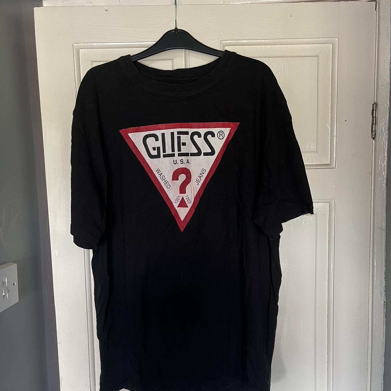 Large black GUESS graphic T-shirt Only worn a few... - Depop