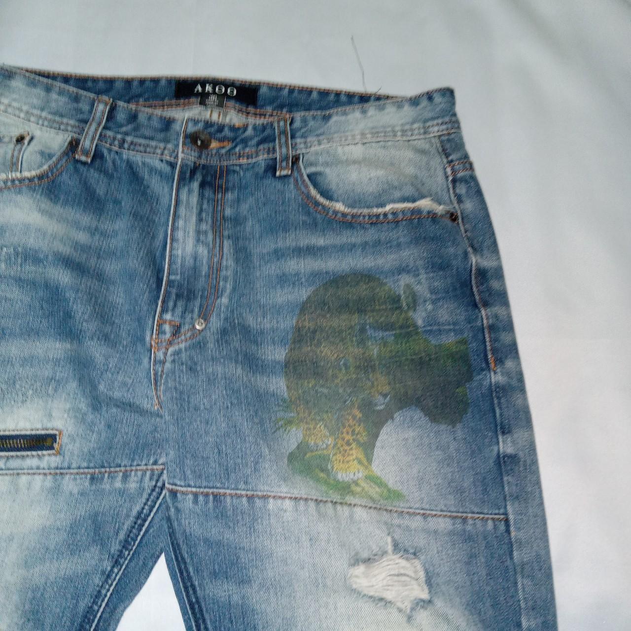 AKOO Distressed denim jeans with a unique,... | Depop