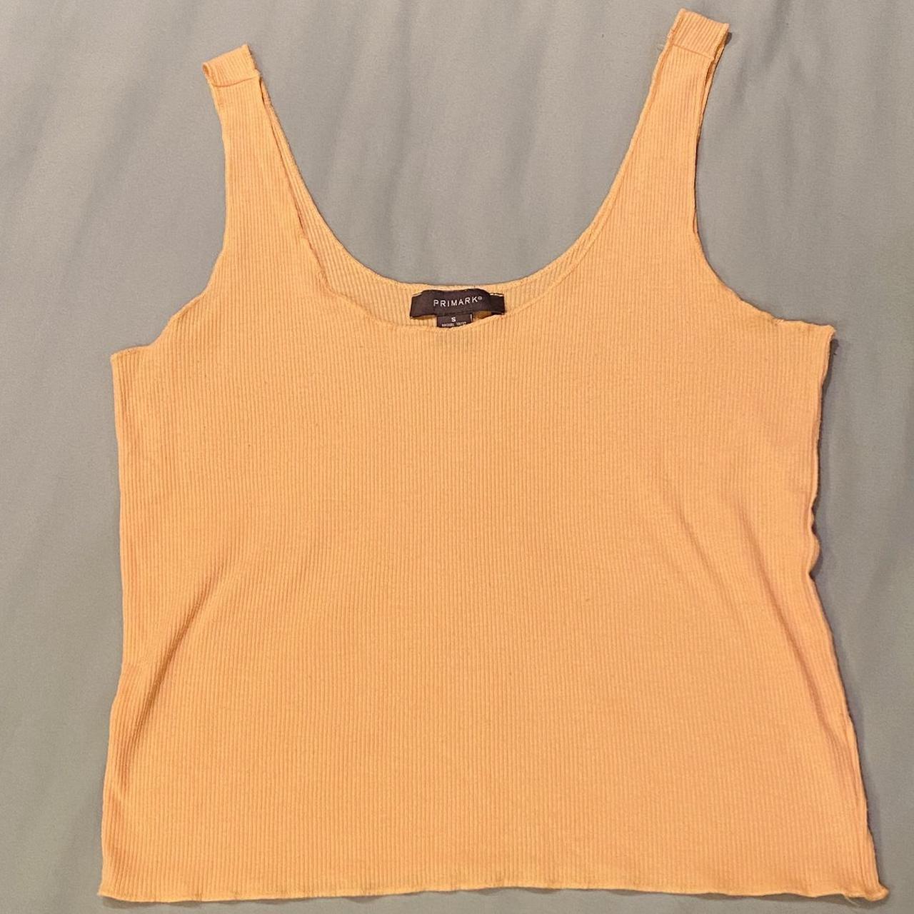 Cute, light yellow/tan, ribbed vest top. Perfect... - Depop