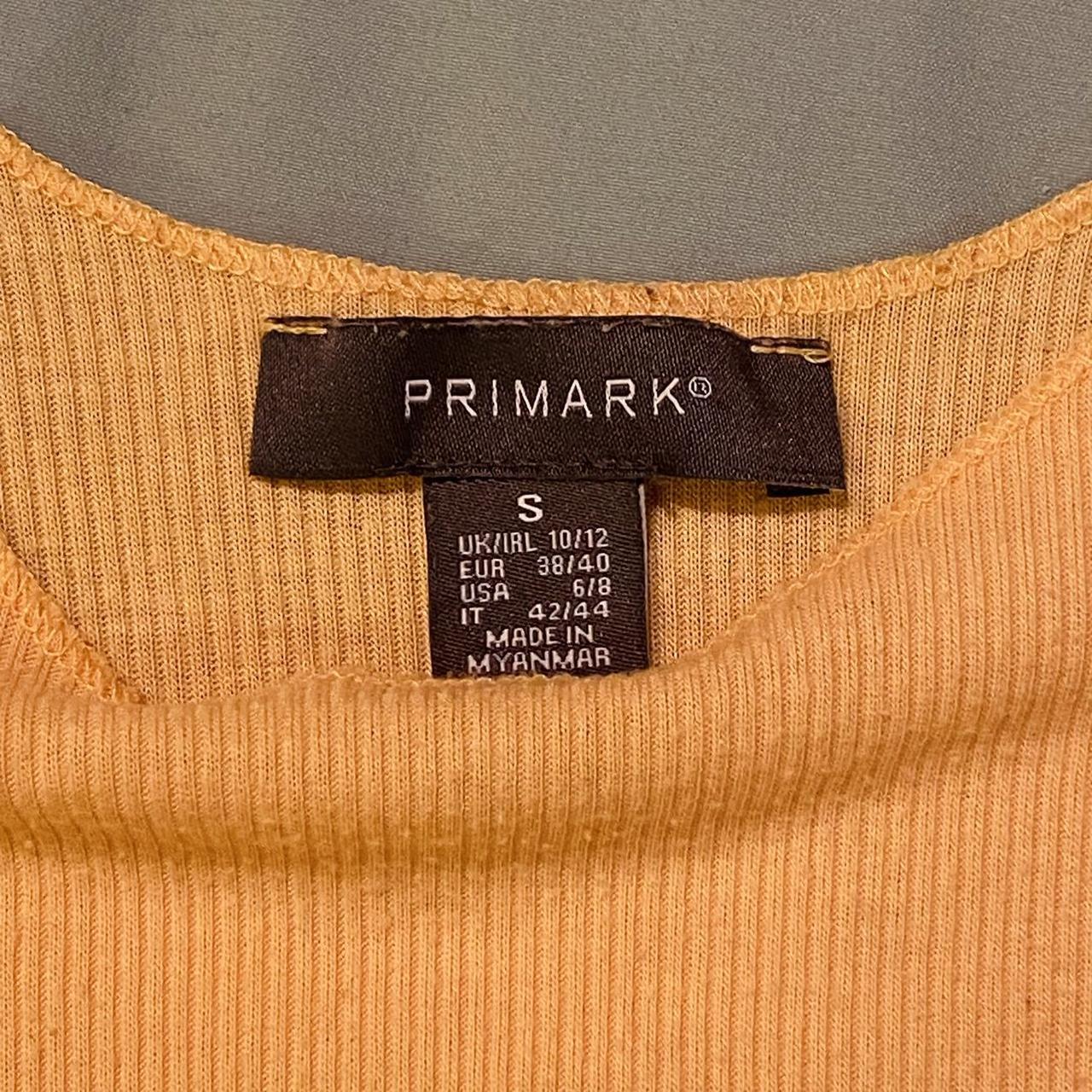 Cute, light yellow/tan, ribbed vest top. Perfect... - Depop