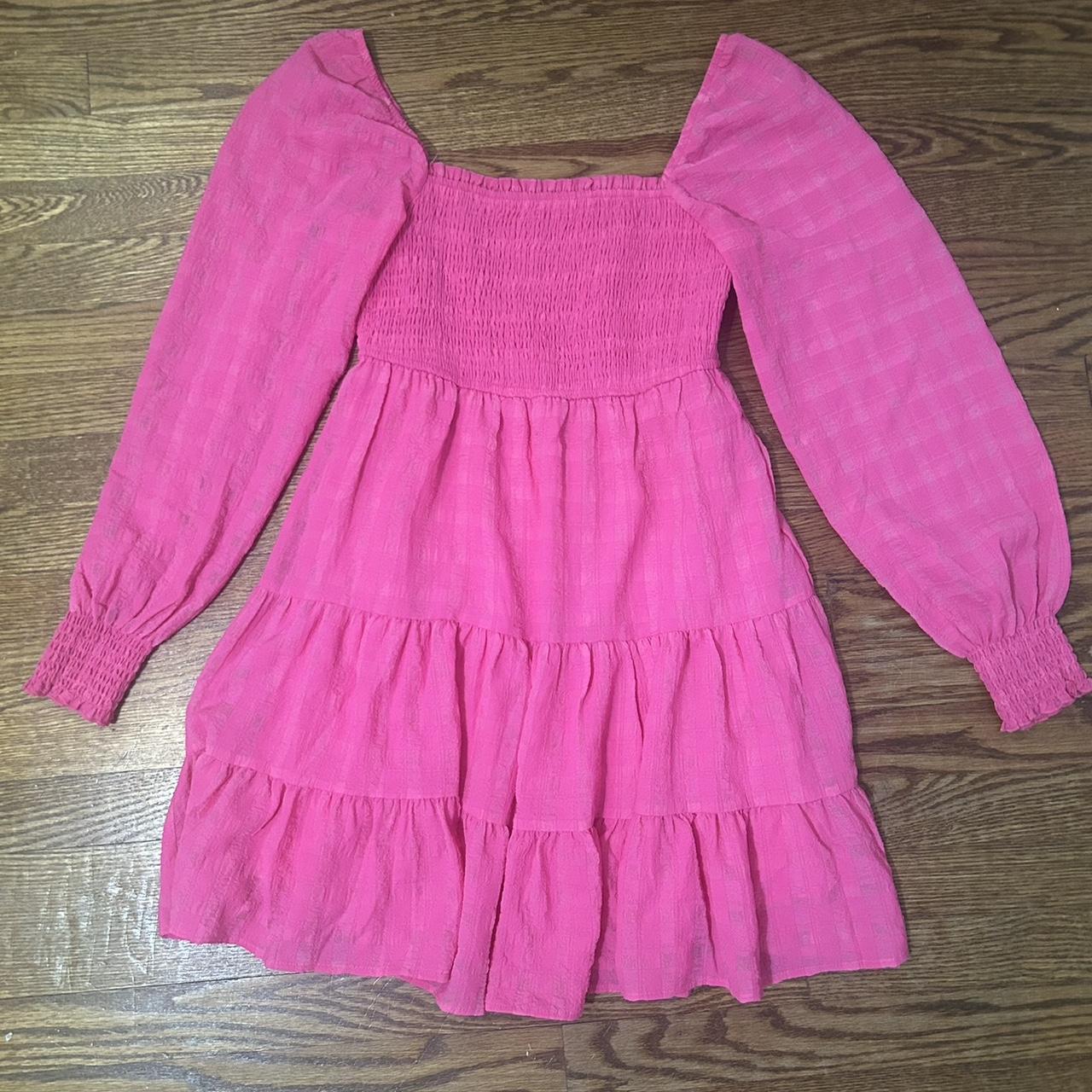 Pink smocked dress with smocked sleeves and tiered... - Depop