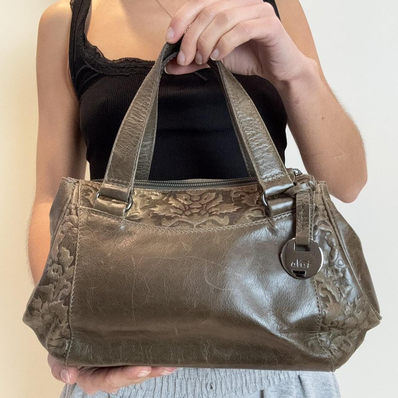 Vintage brown Tula leather handbag with floral... | Depop
