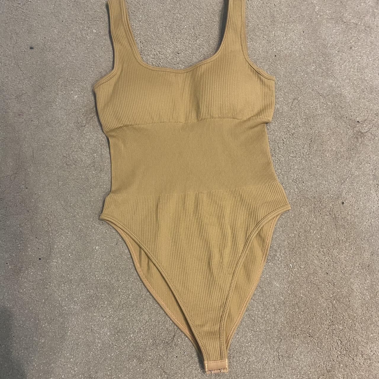 Beige tummy control bodysuit - Depop