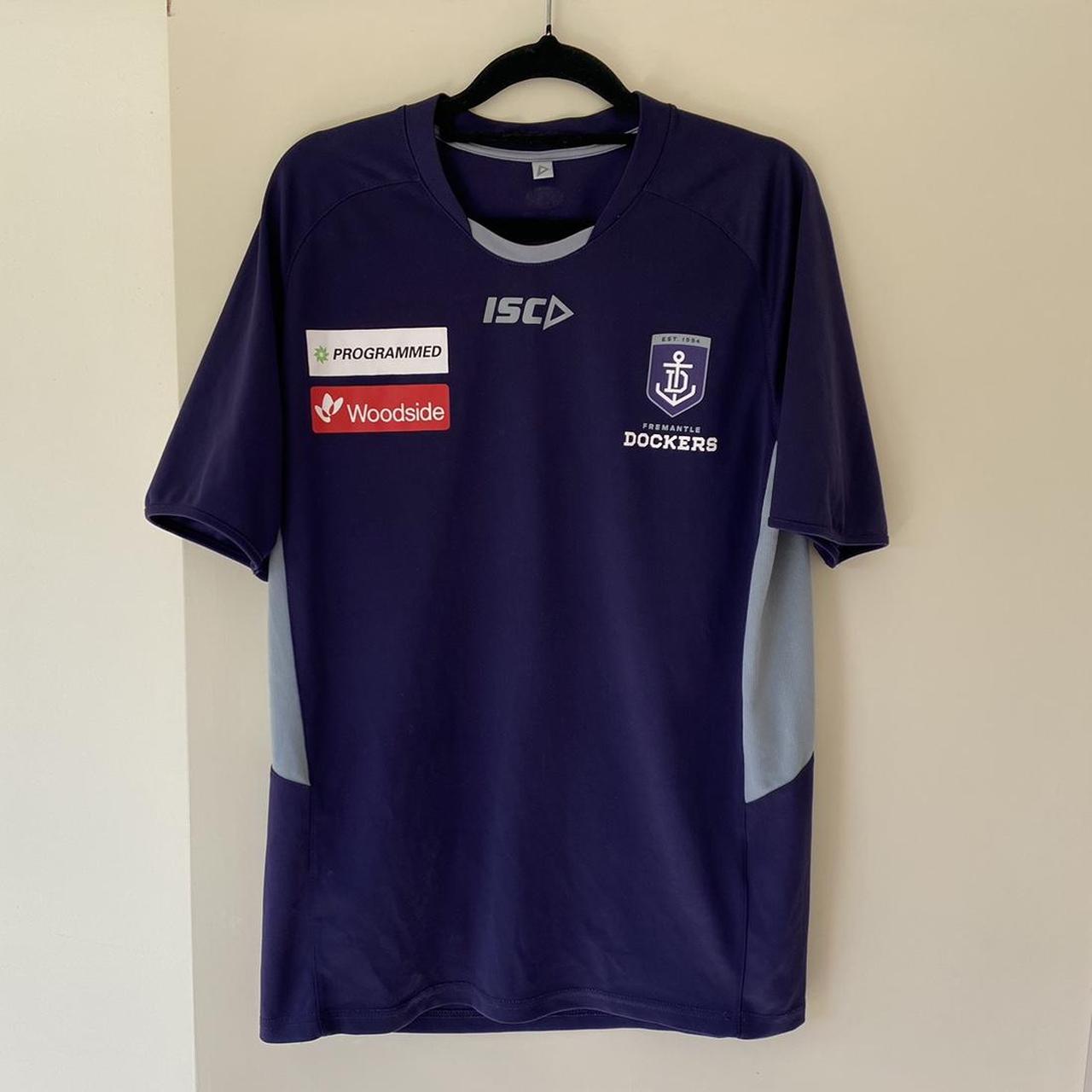 Fremantle Dockers AFL Jersey Size Large Pit to pit... - Depop