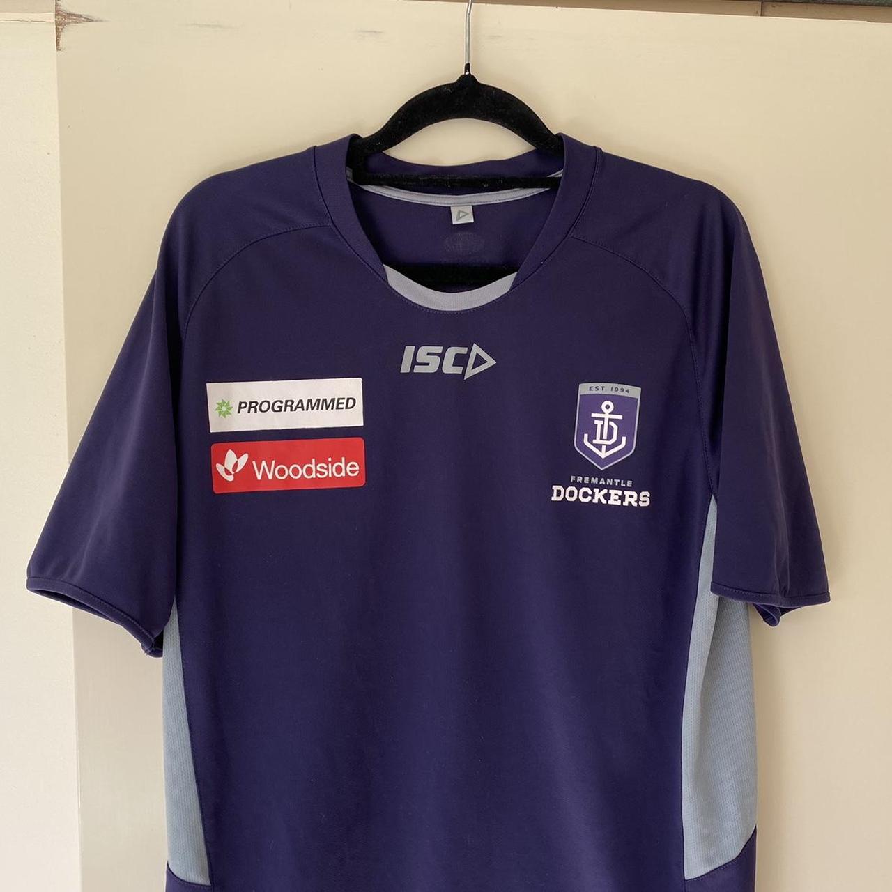 Fremantle Dockers AFL Jersey Size Large Pit to pit... - Depop
