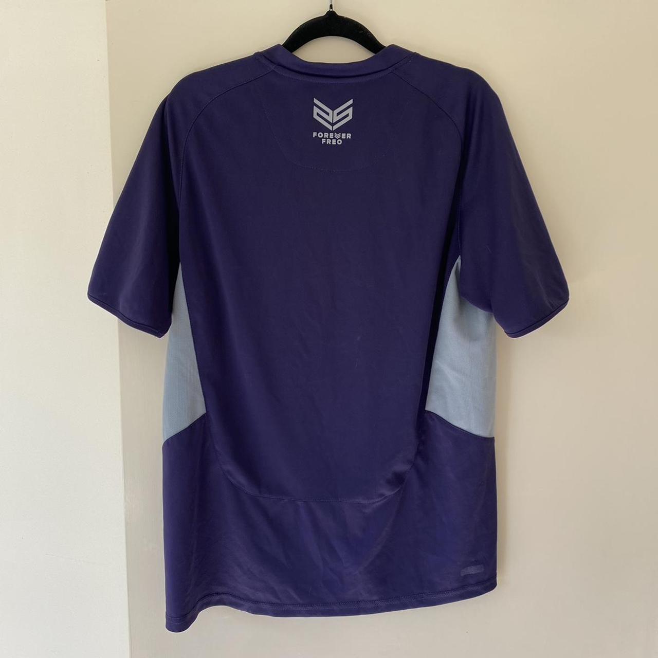 Fremantle Dockers AFL Jersey Size Large Pit to pit... - Depop