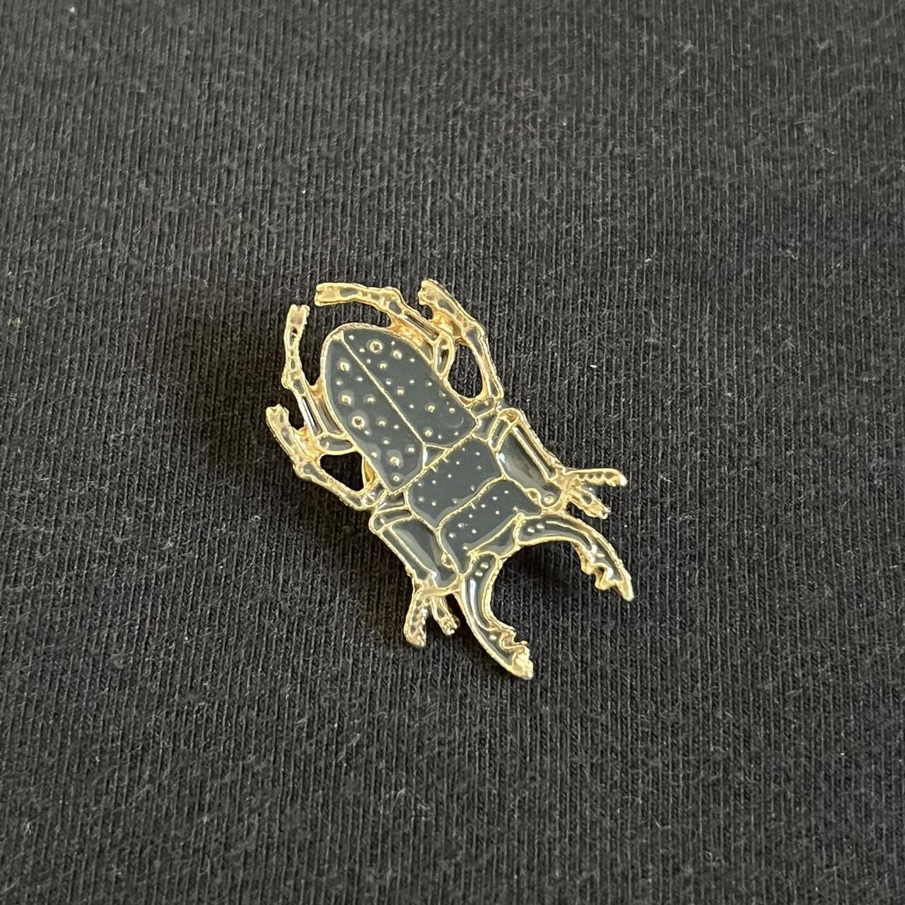 Gold and black tone beetle enamel pin #goth... | Depop