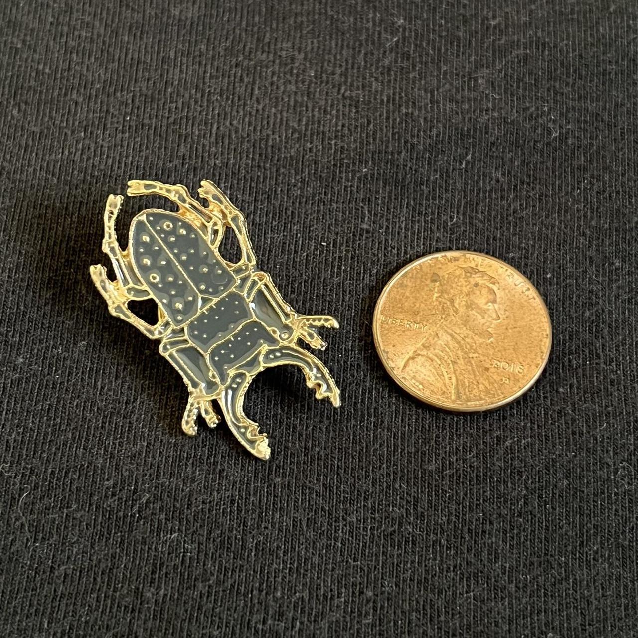 Gold and black tone beetle enamel pin #goth... | Depop