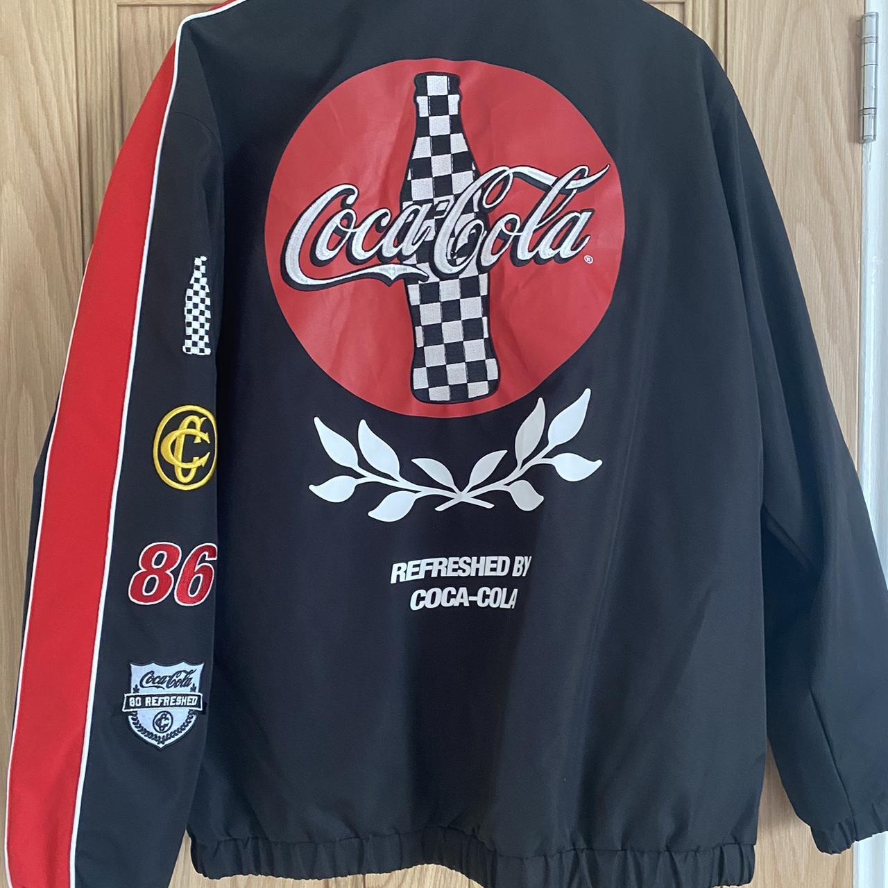 Coca Cola rally style jacket bought from primark for... - Depop