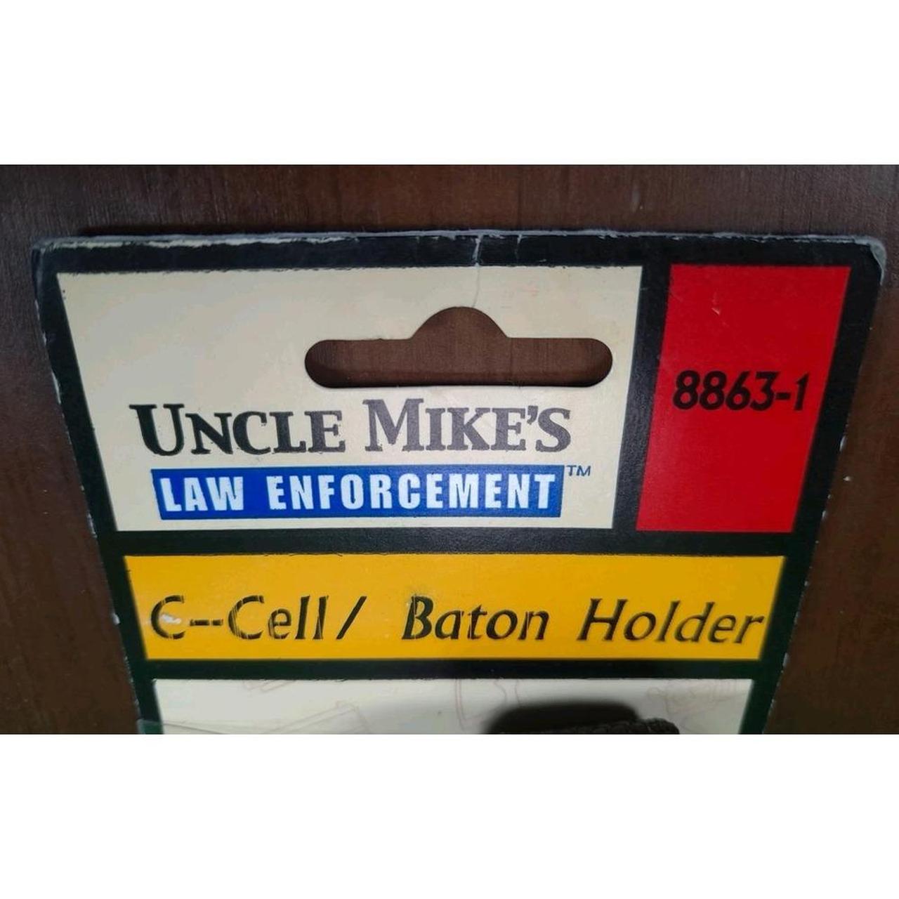 Uncle Mikes Law Enforcement C-Cell Baton Holder... | Depop