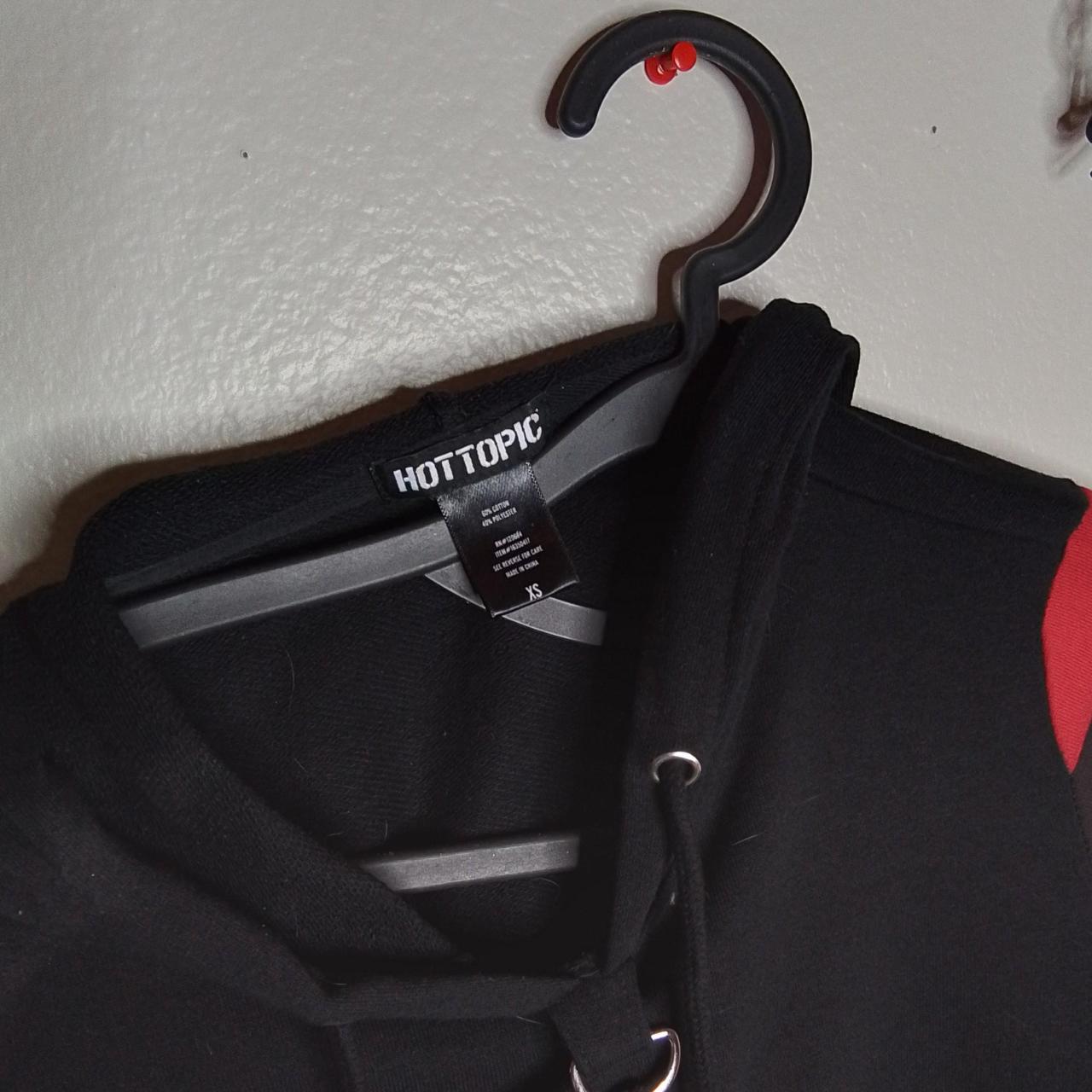 Hot Topic cropped hoodie with red striped sleeves... - Depop