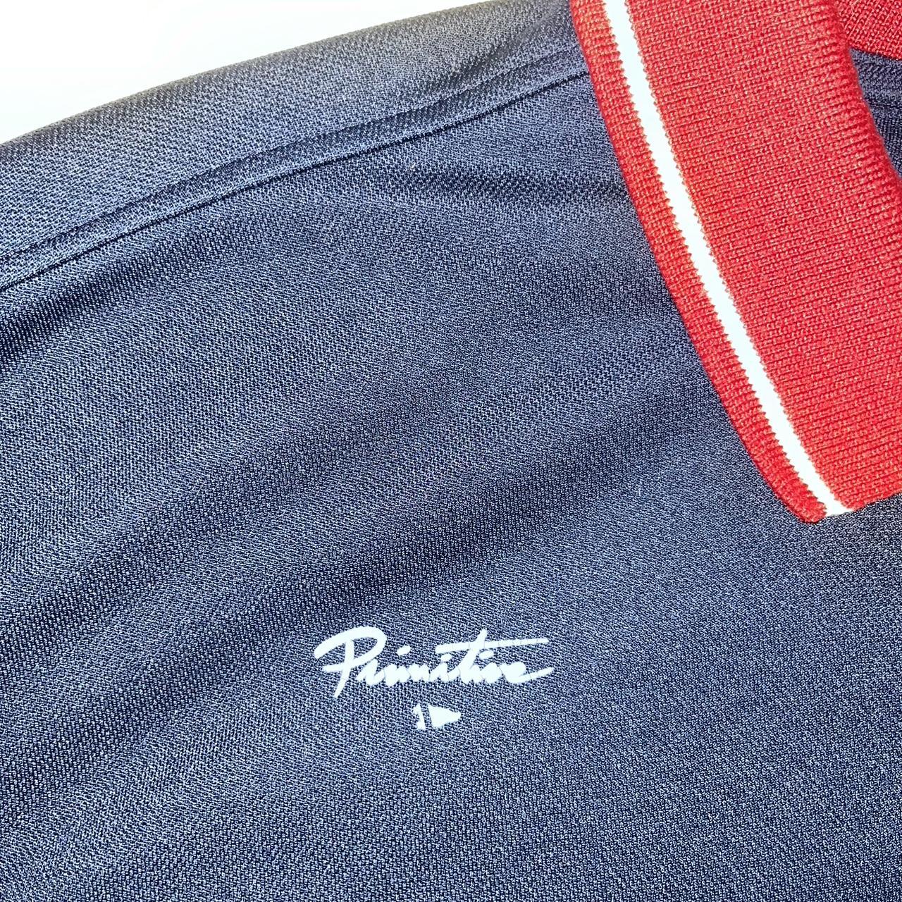 Navy Primitive Skateboards jersey with red collar... - Depop