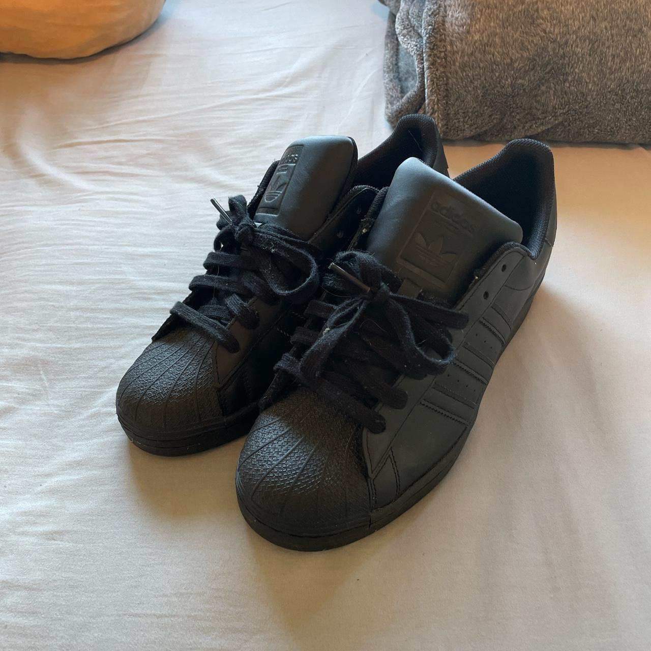 All black adidas shell toe - Depop