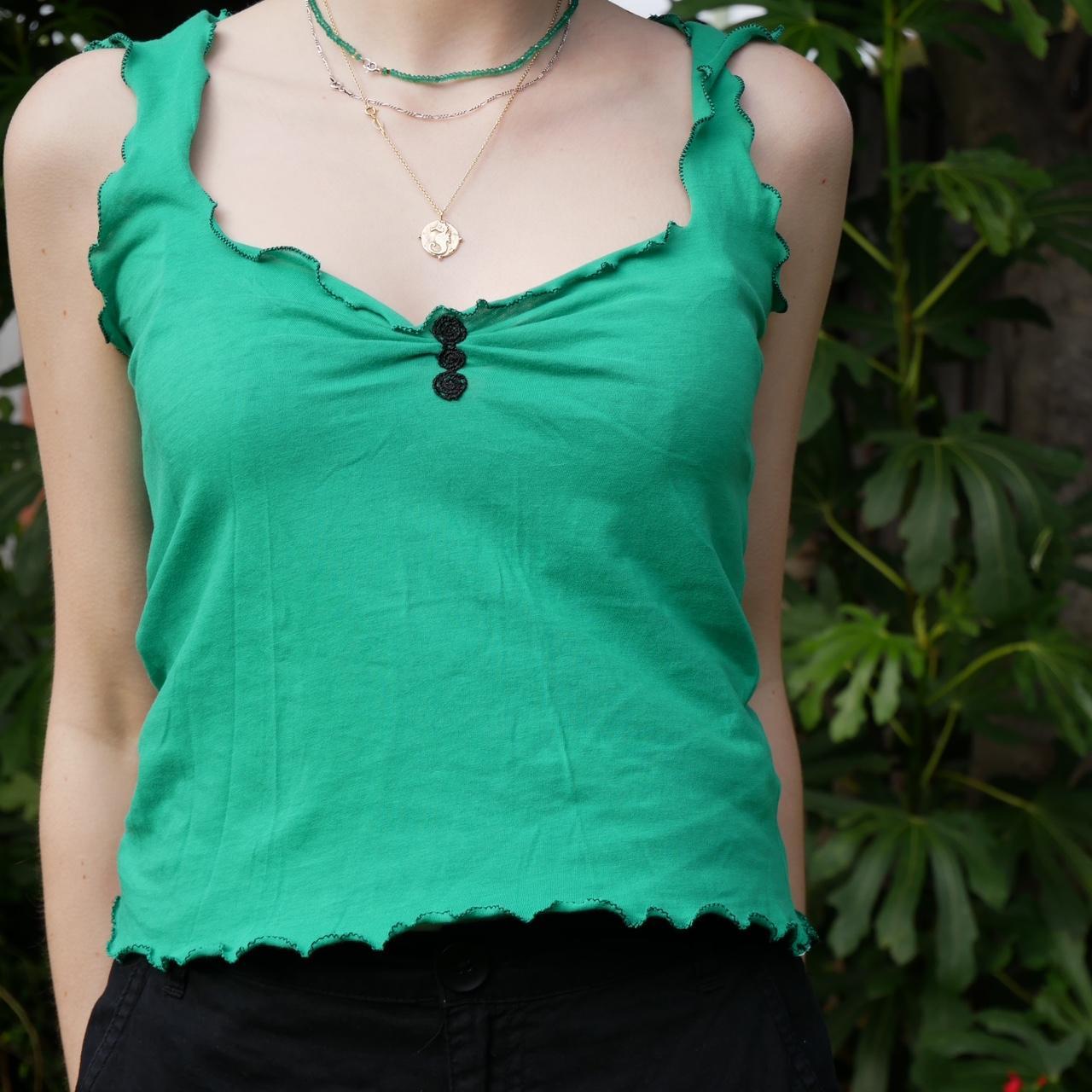 Green singlet with lettuce hem and black lace... - Depop