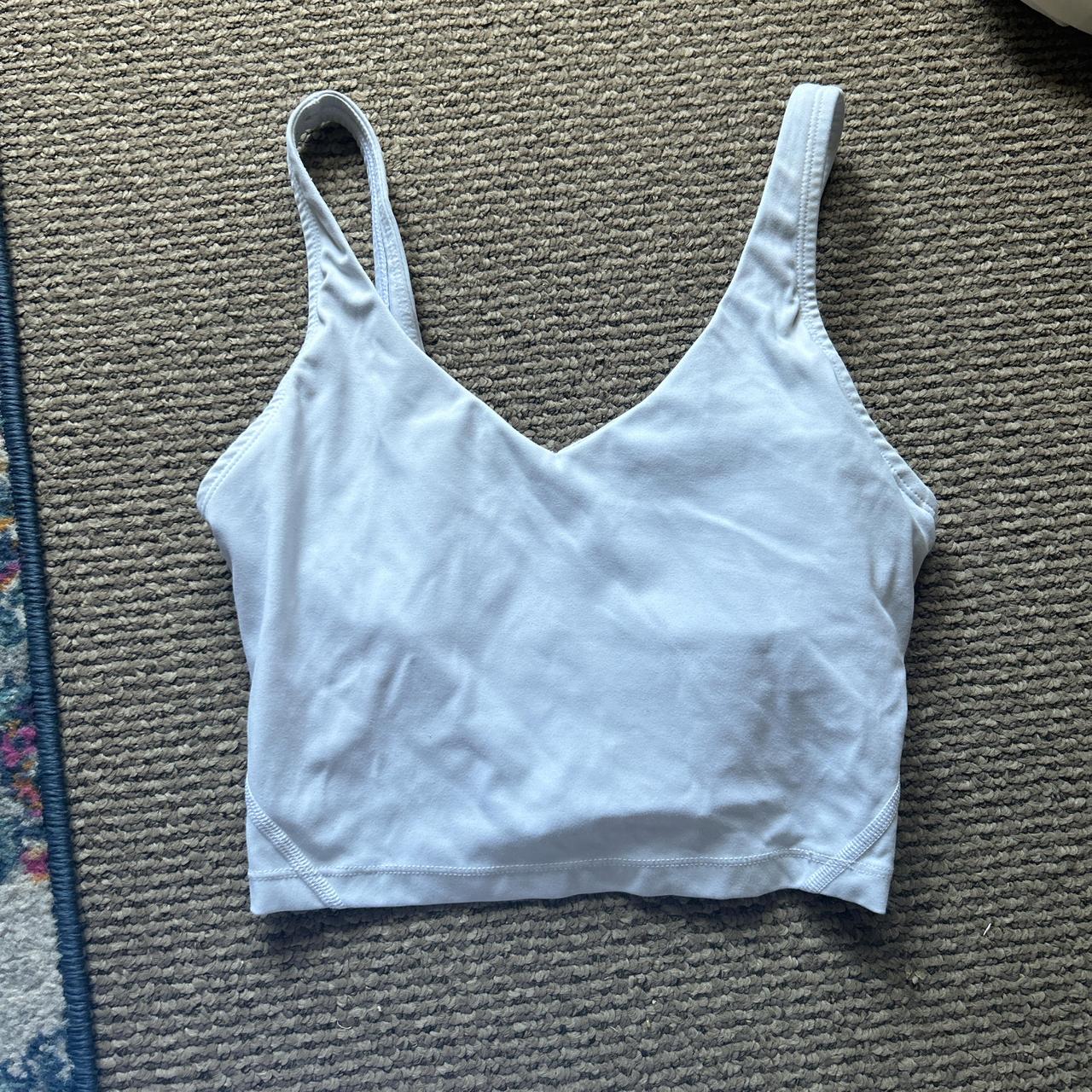 White workout tank top Very similar to the... - Depop