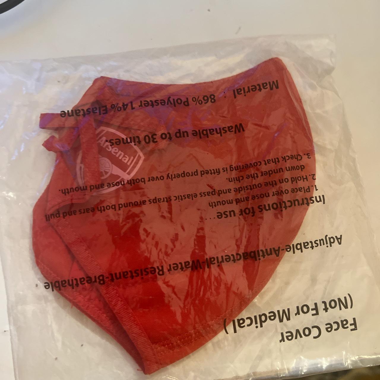 Arsenal face mask new and unopened - Depop