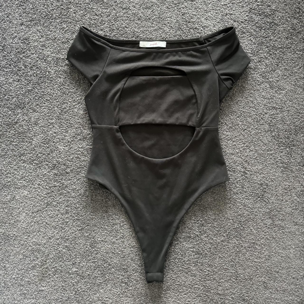 Black bodysuit v good condition nice material! Size... - Depop