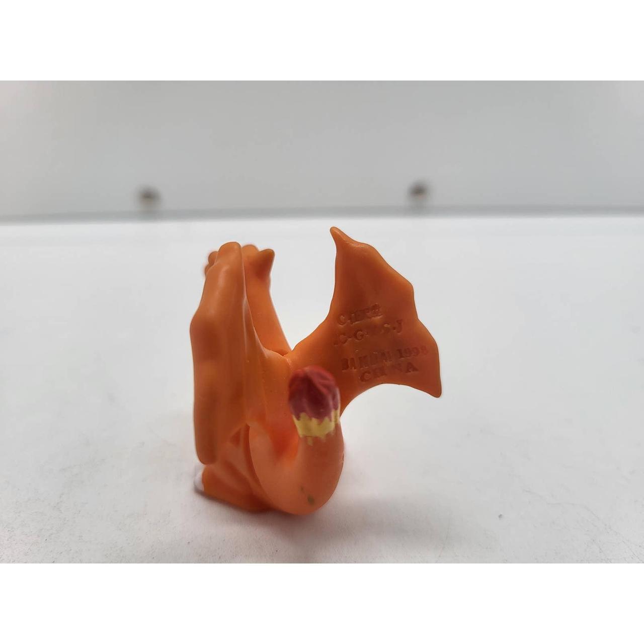Charizard Finger puppet figure. Authentic... - Depop