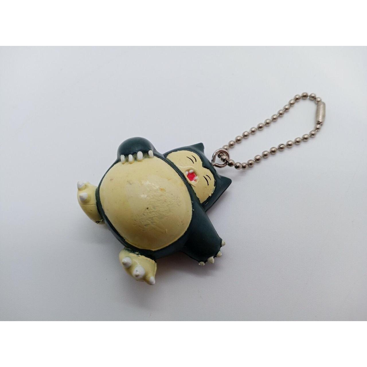 This Snorlax keychain charm is an official Pokemon... | Depop