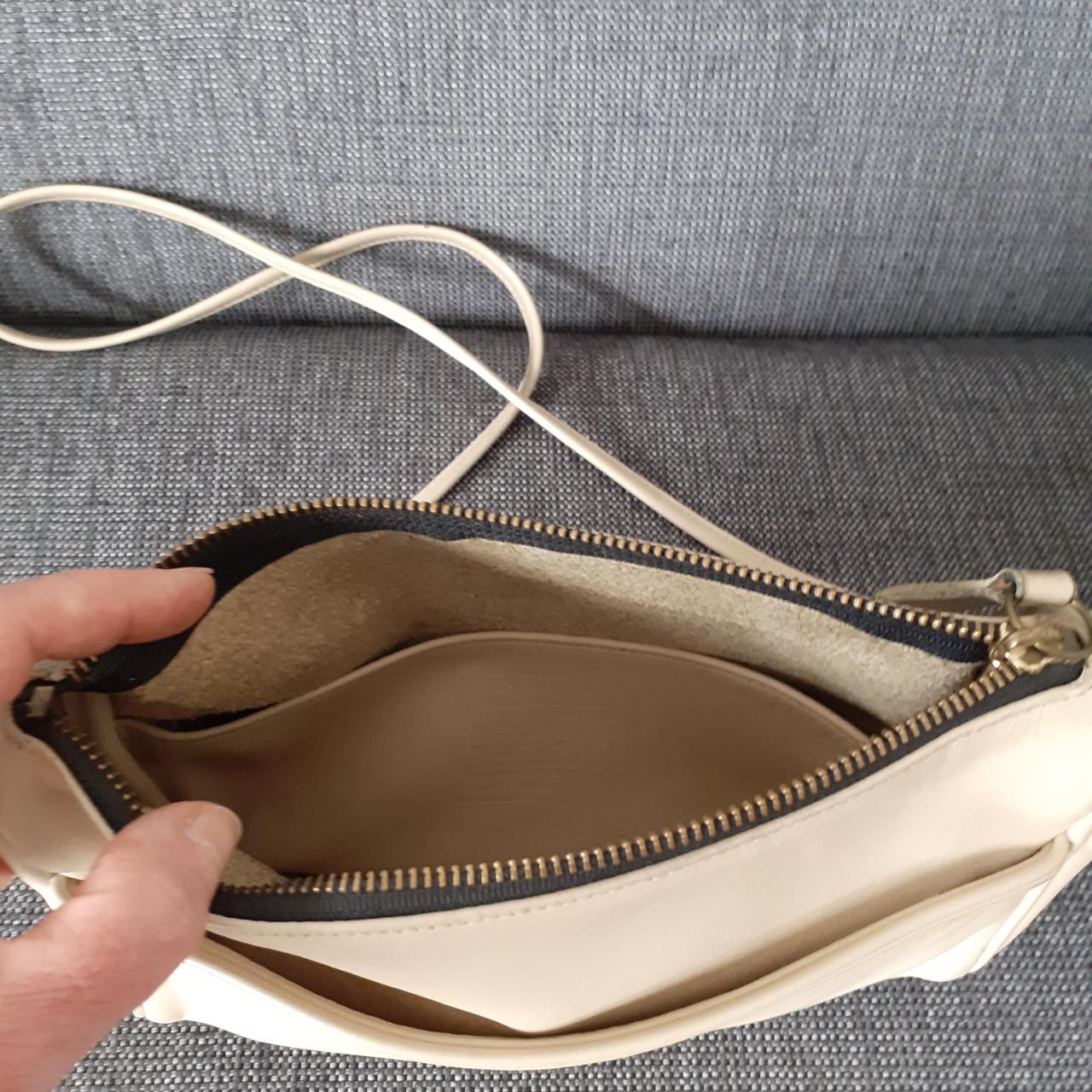 Coach cross-body bag in bone. Small scuff on the... - Depop