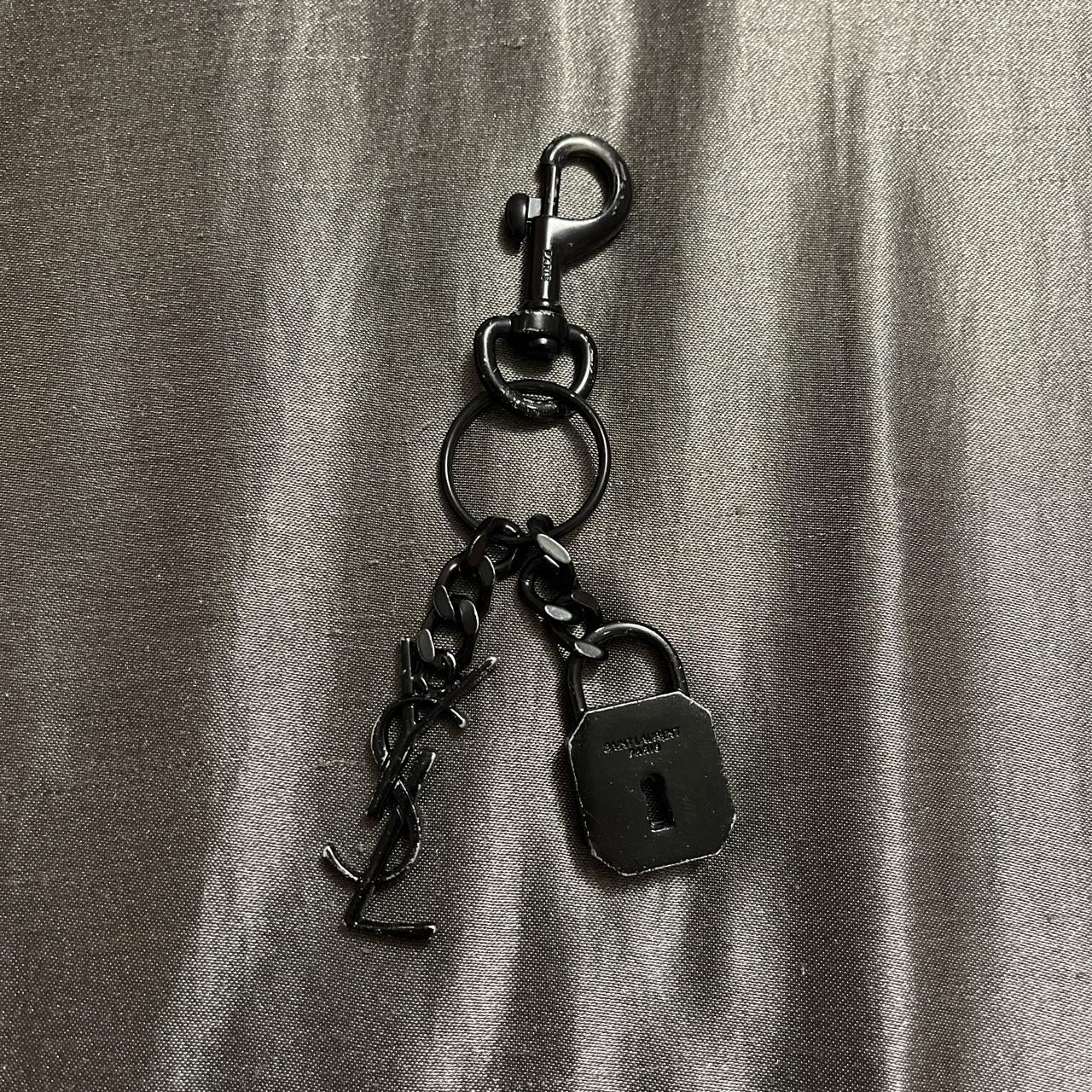 Black YSL logo and lock keychain #YSL... - Depop