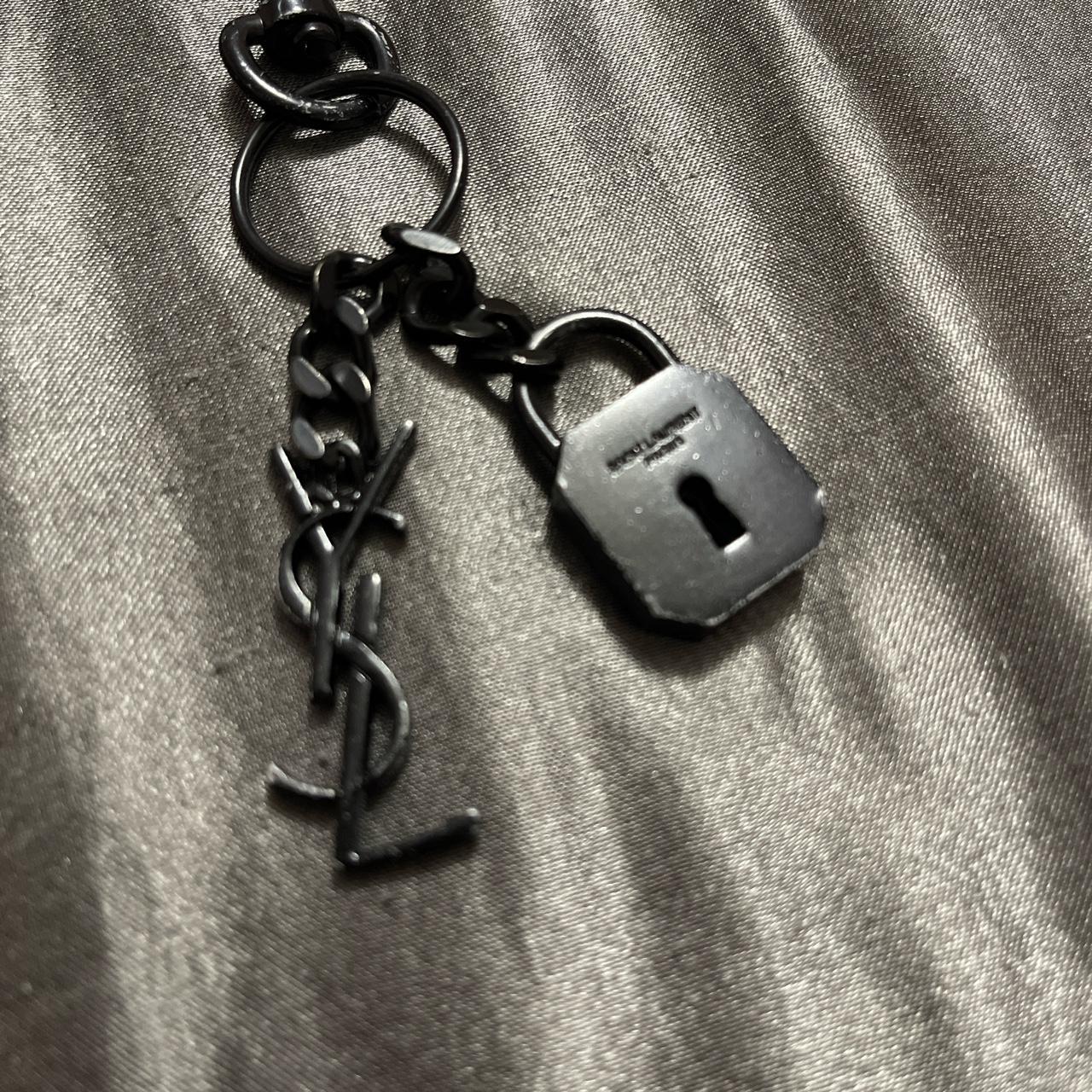 Black YSL logo and lock keychain #YSL... - Depop