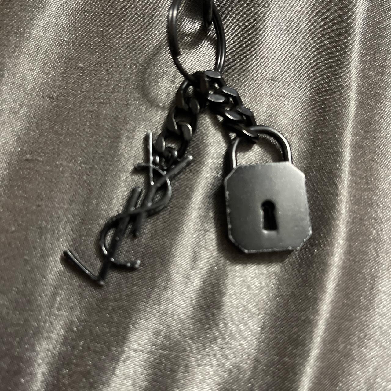 Black YSL logo and lock keychain #YSL... - Depop