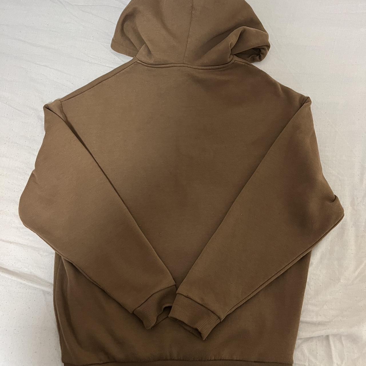 brown graphic hoodie. Great quality, worn a few... - Depop