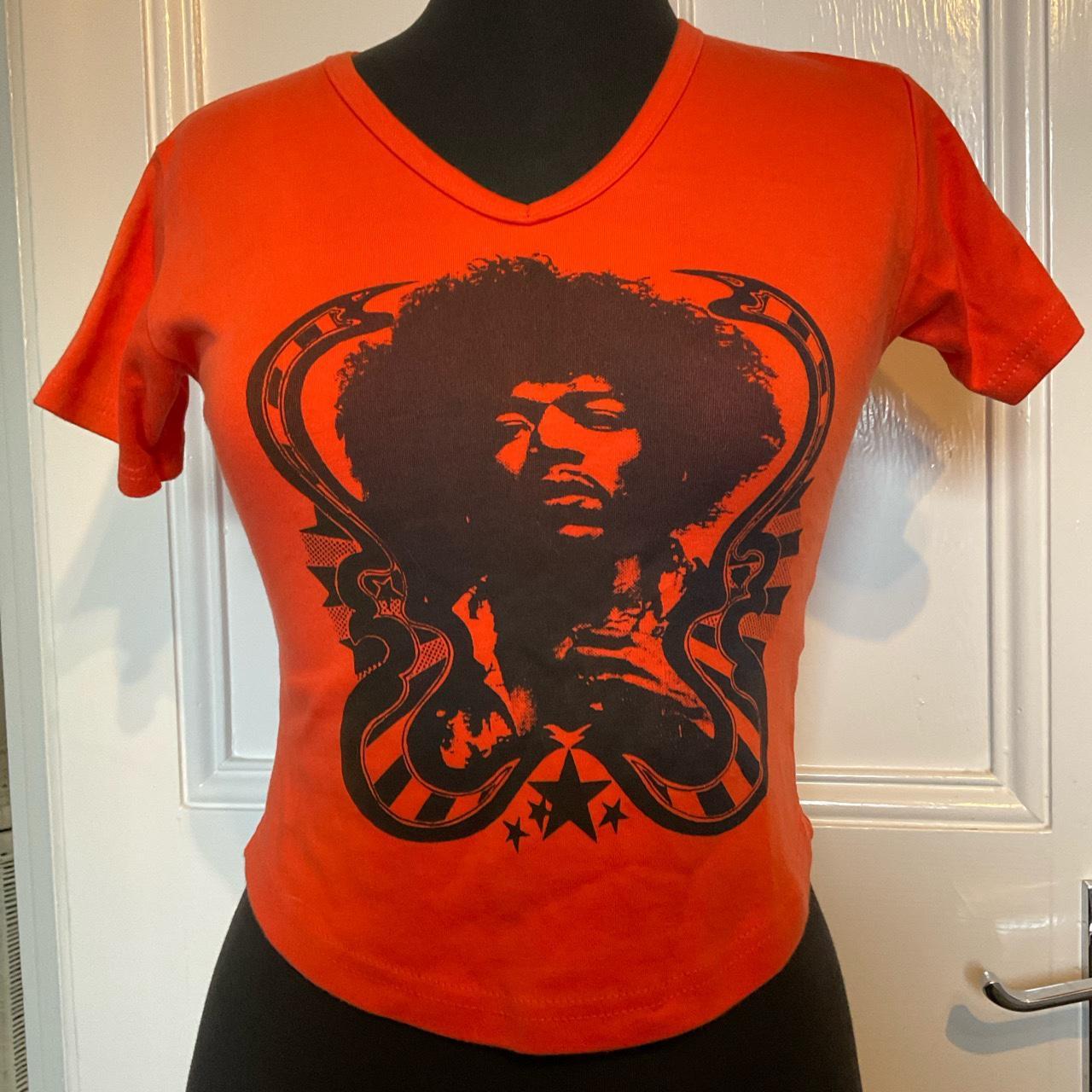 Orange Jimi Hendrix cropped v-neck t shirt Would fit... - Depop
