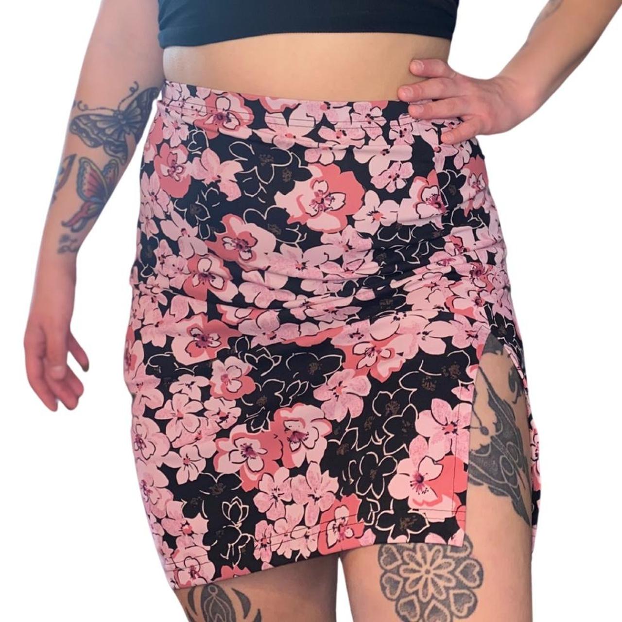 Pink and black floral mini skirt. Brand is IZ Byer.... | Depop