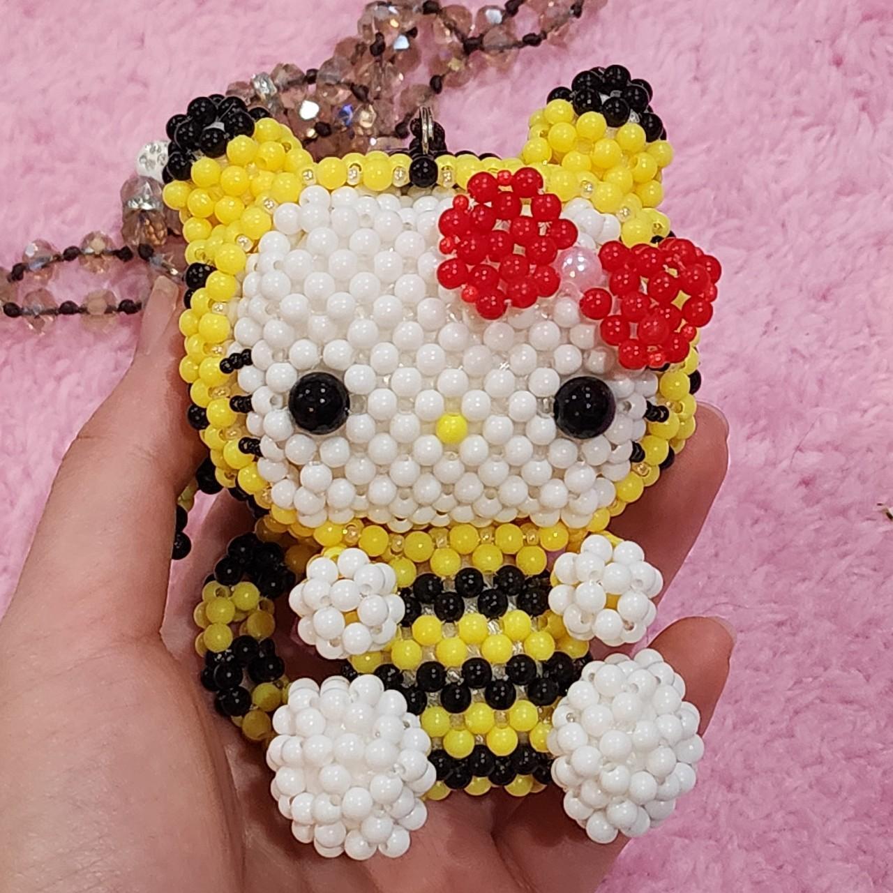 3D hello kitty kandi tiger necklace+keychain What's... - Depop