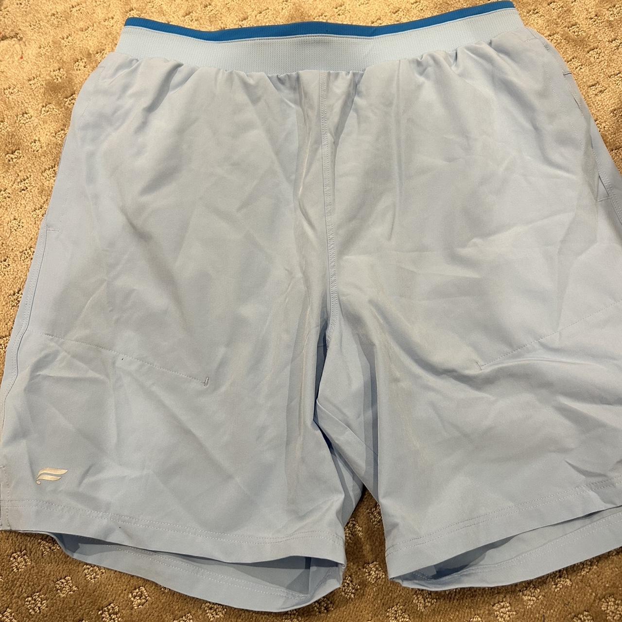 Fabletics light blue men’s lined workout shorts... - Depop