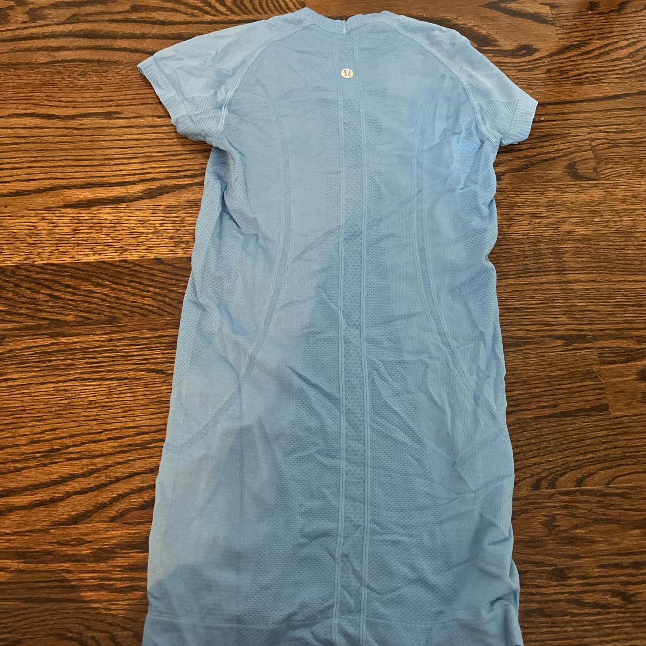 Baby blue Lululemon swiftly tee. Size: 2 - Depop
