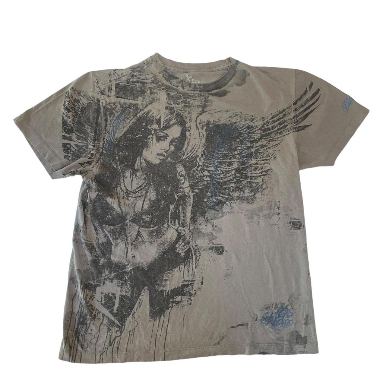 Mark Ecko Woman with Wings graphic T-Shirt used in... - Depop